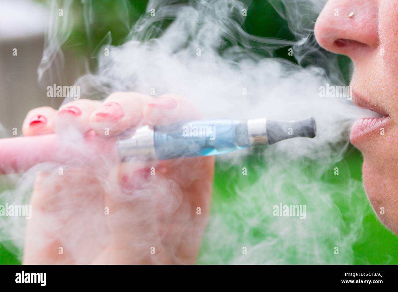 Inhaling smoke hi-res stock photography and images - Alamy