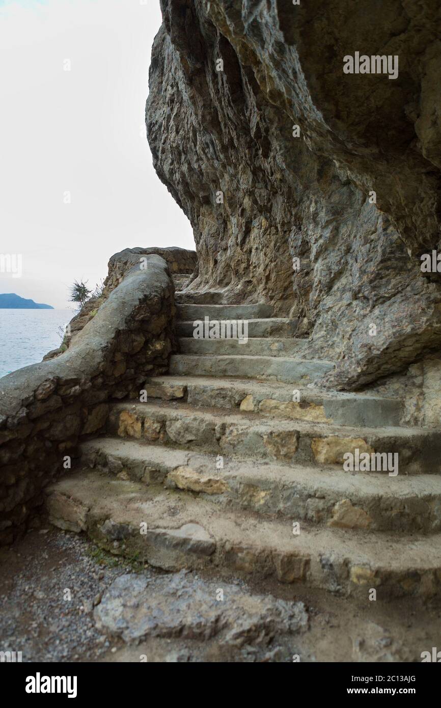 Trail Golitsyn - Falcon Path a mountain pathway carved on side of Koba ...