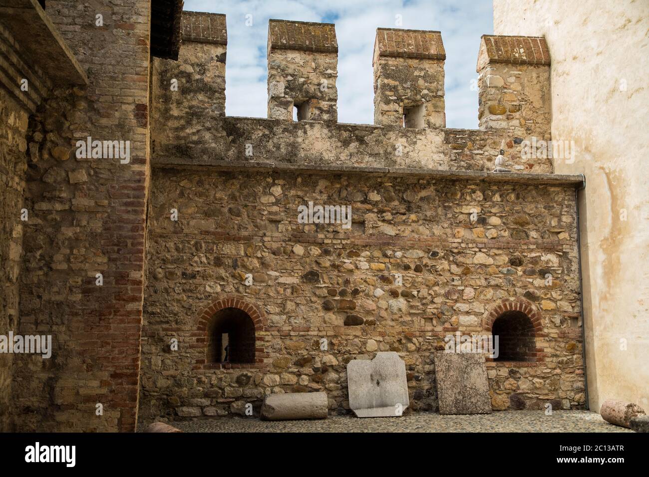 Inside castle walls of Scaligero castle, Sirmione, Italy Stock Photo ...