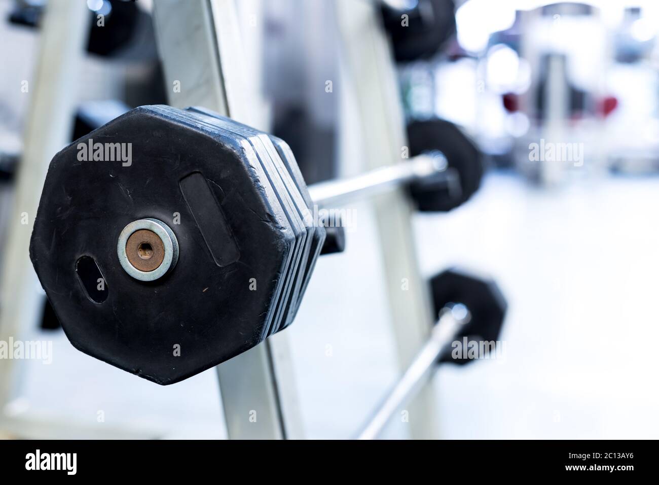 equipment for power exercise in modern gym Stock Photo - Alamy