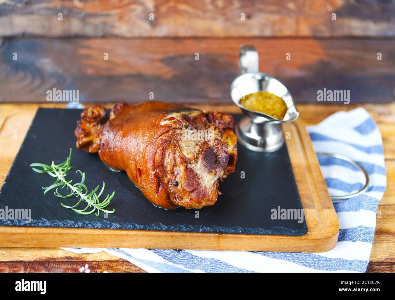 Roasted pork leg (rulka) served with garlic sauce Stock Photo - Alamy