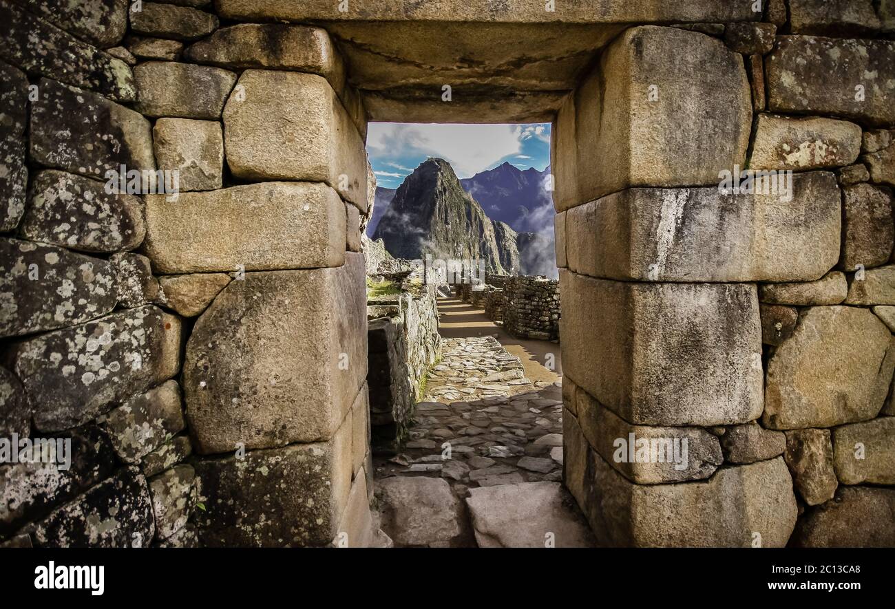 View of the Huayna Picchu through a stone gate of Machu Piccu Stock ...