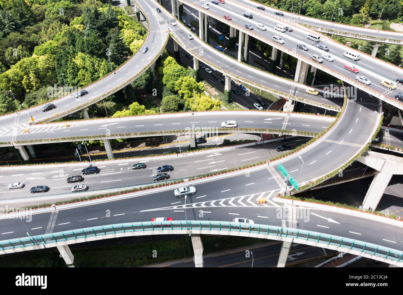 busy traffic on road junction in shanghai Stock Photo - Alamy