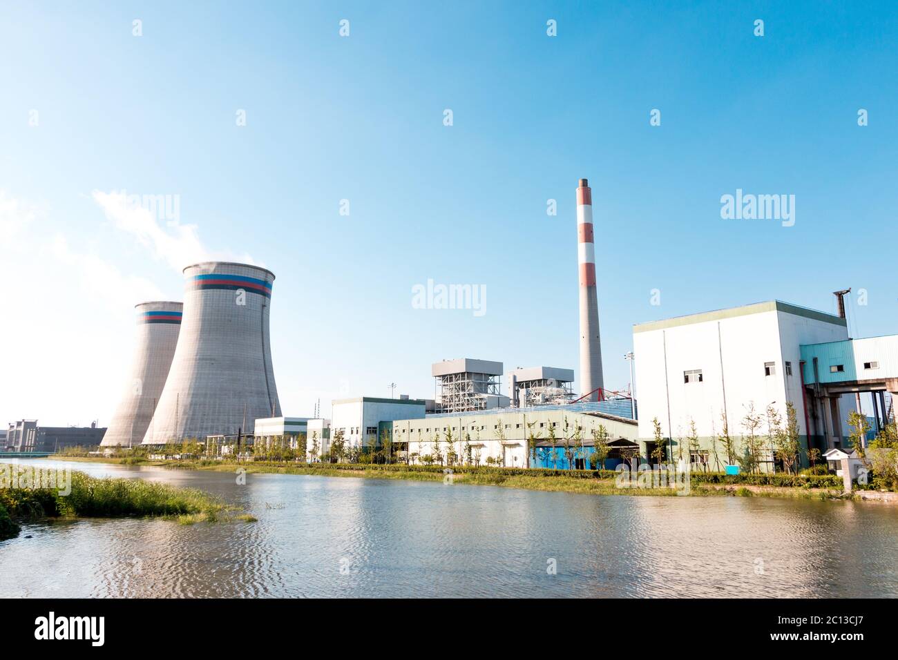 modern power plant near water Stock Photo - Alamy