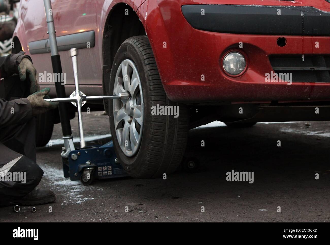 installation of passenger car wheel and replacement on winter tire ...