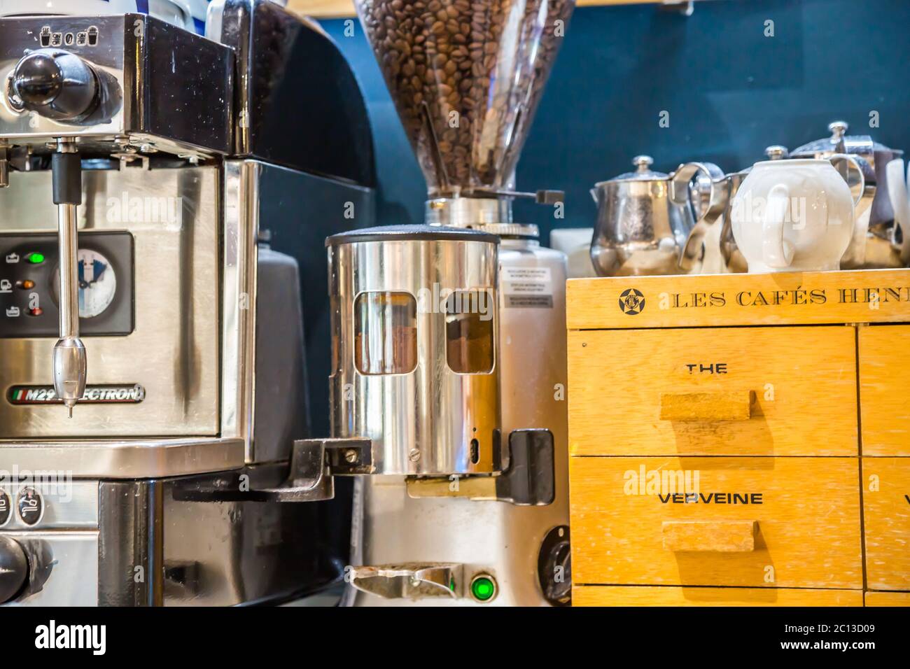 Portrait of smart male bartender at counter in cafe Stock Photo - Alamy