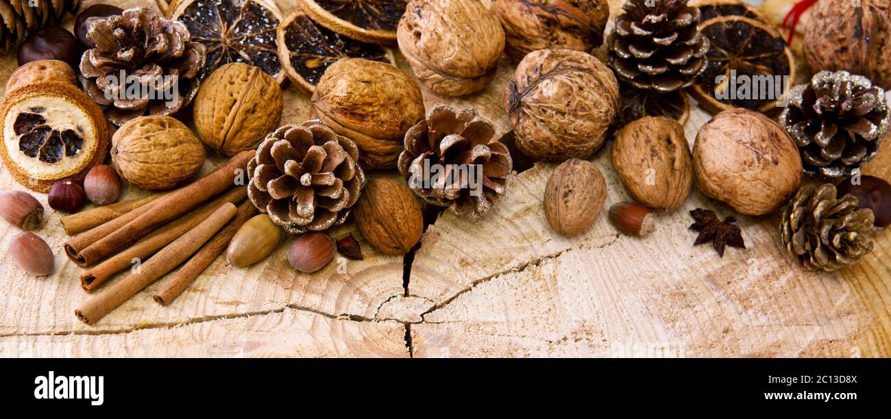 Christmas decoration with different nuts and cinnamon sticks Stock ...