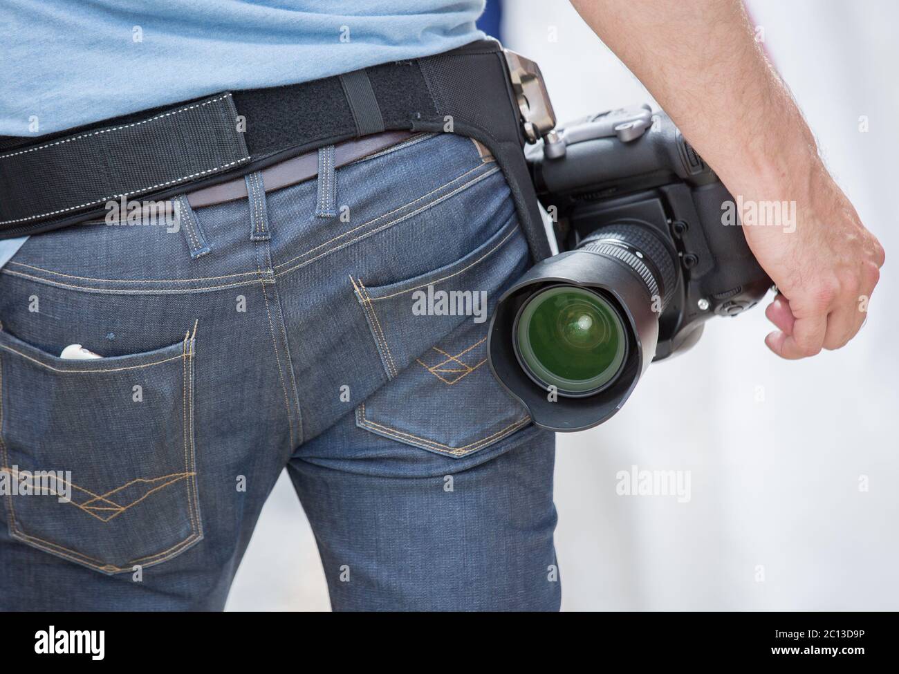 Professional photographer with a belt clip for his camera Stock Photo ...