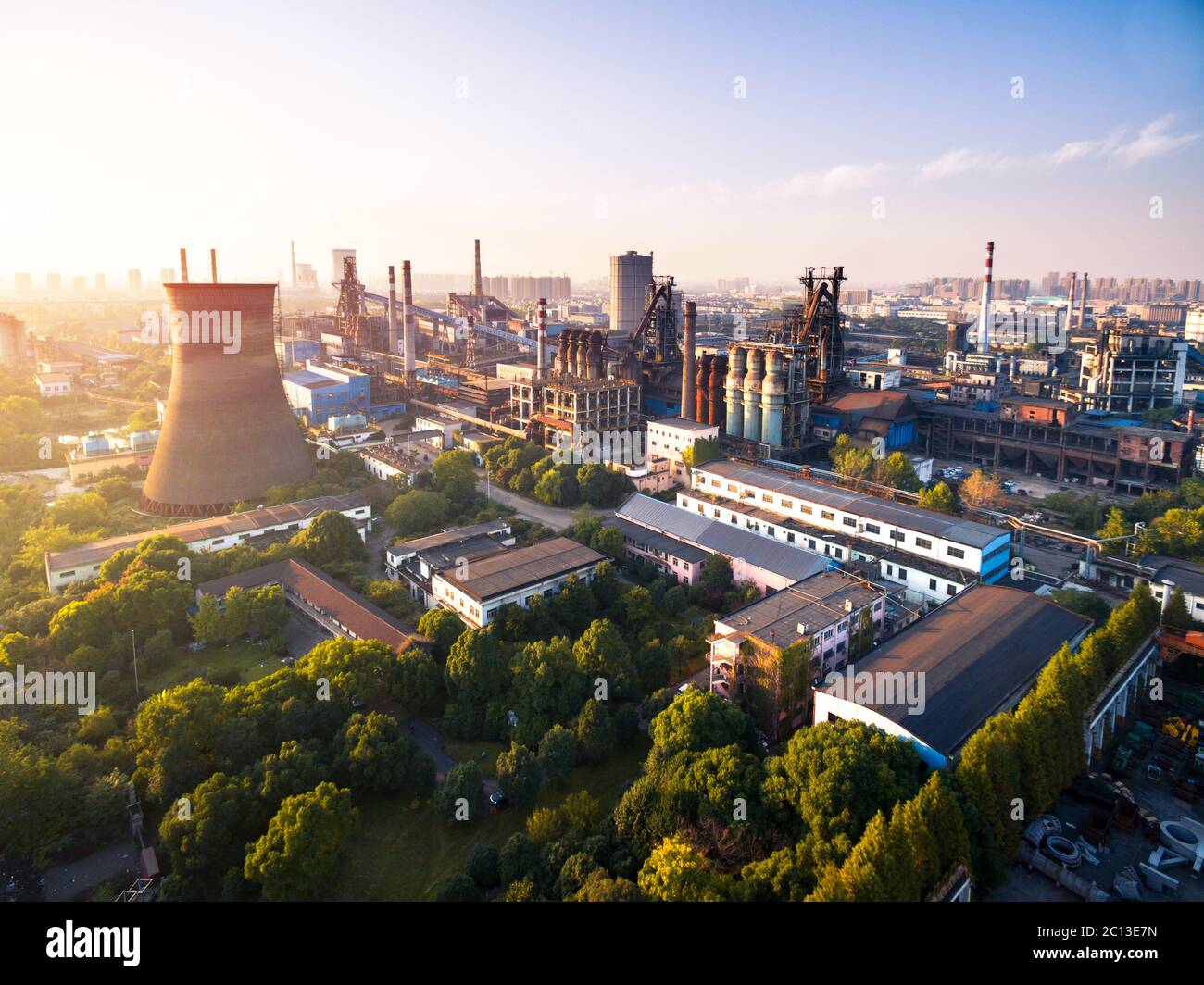 constructions in modern power station at sunrise Stock Photo - Alamy