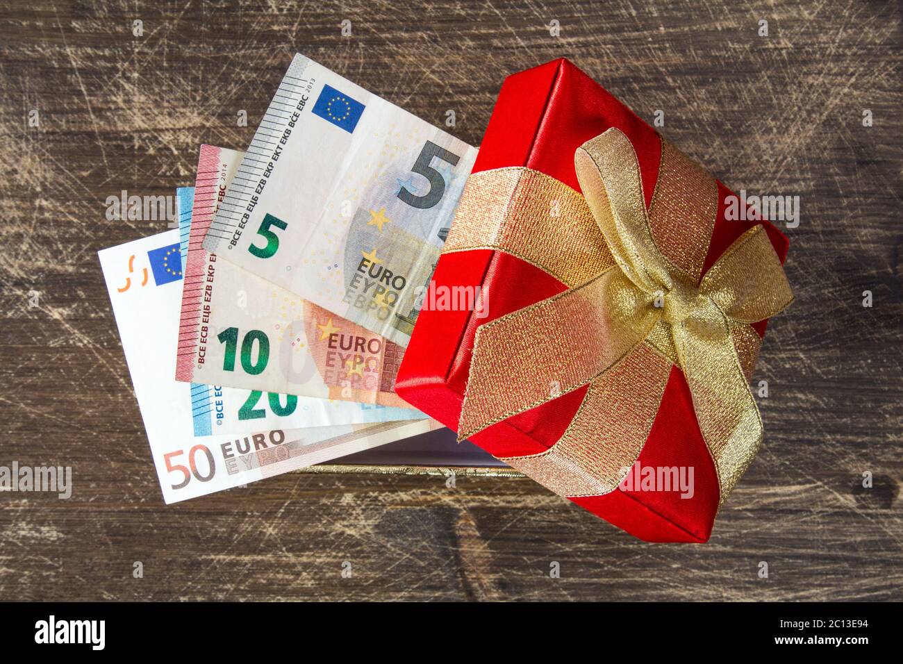 Gift Box with Euro currency Stock Photo - Alamy