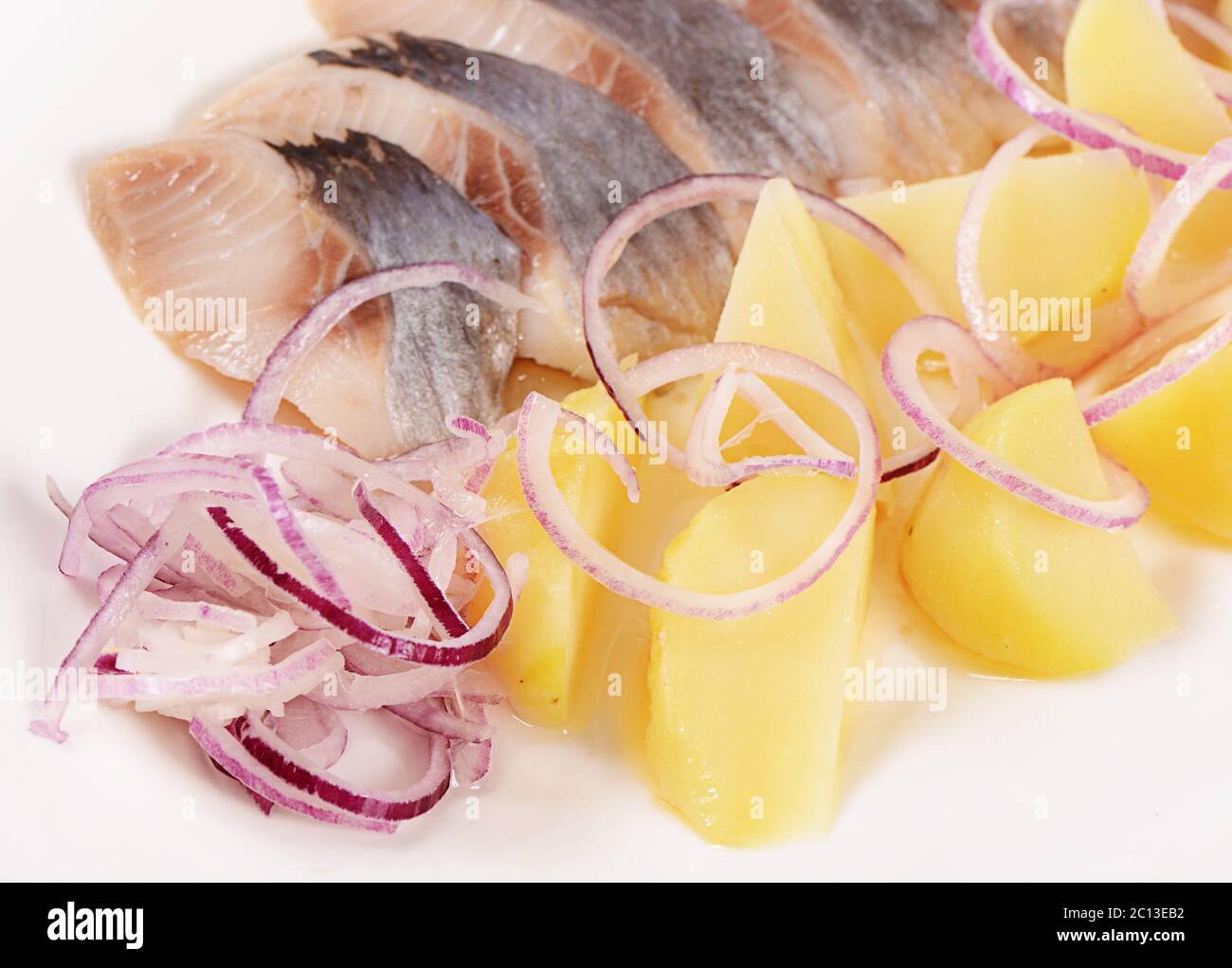 Herring with boiled potatoes hi-res stock photography and images - Alamy