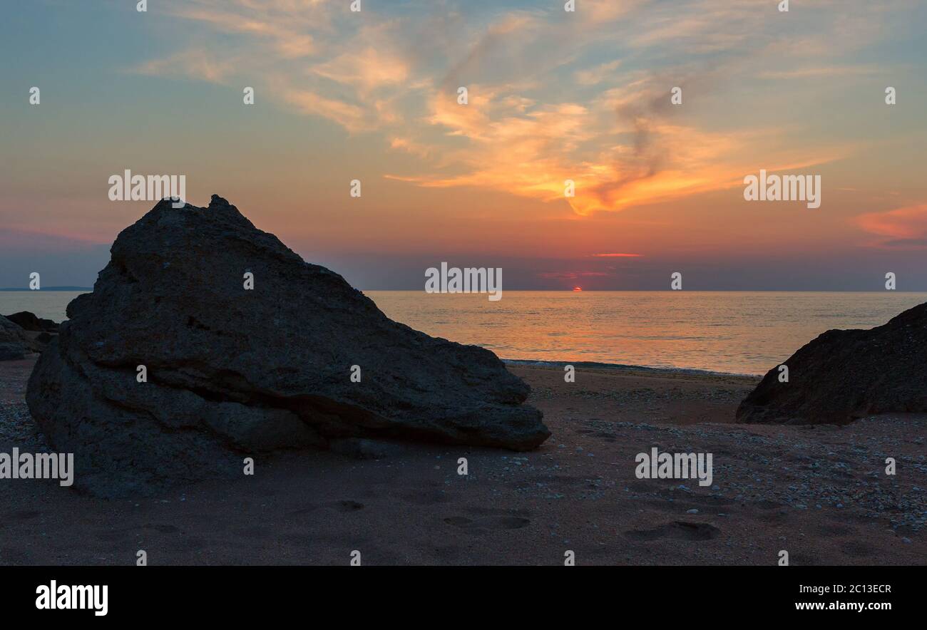 Sunset over the Sea of Azov on Generals beach. Karalar regional ...