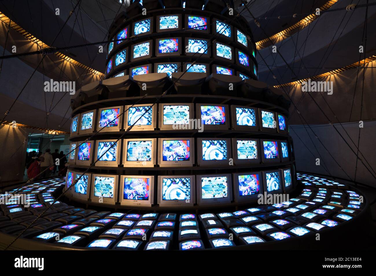 tower style architecture with illuminated displays Stock Photo - Alamy