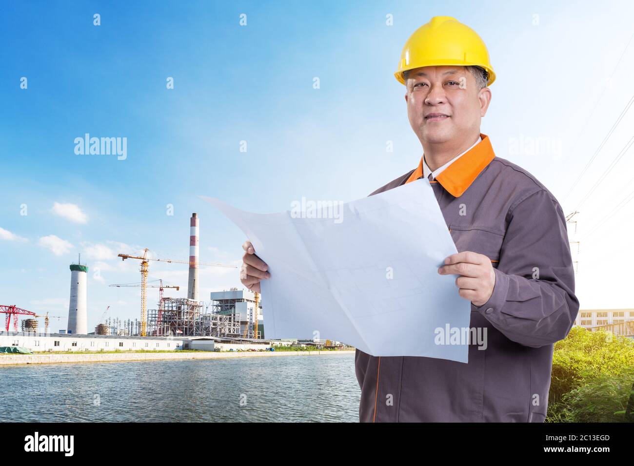 old asian man engineer with power plant Stock Photo - Alamy