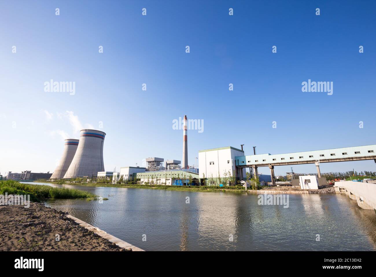 modern power plant near water Stock Photo - Alamy