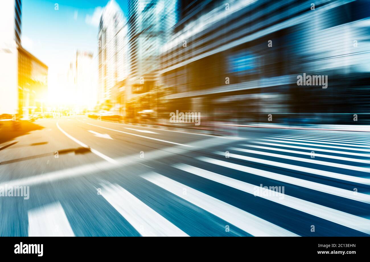 road intersection in midtown of modern city at sunrise Stock Photo - Alamy