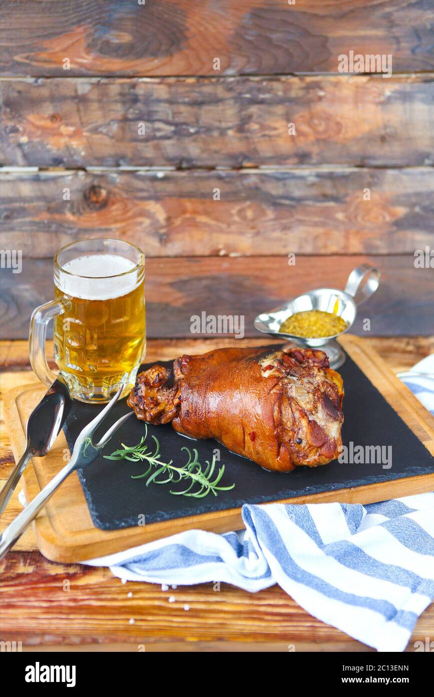 Roasted pork leg (rulka) served with garlic sauce Stock Photo - Alamy