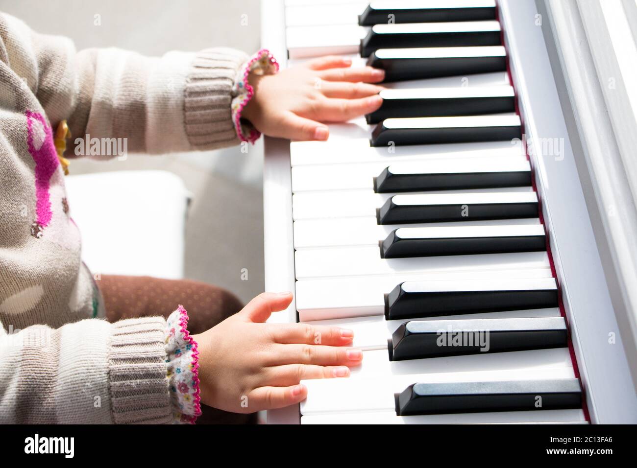 hand touch piano keys Stock Photo - Alamy