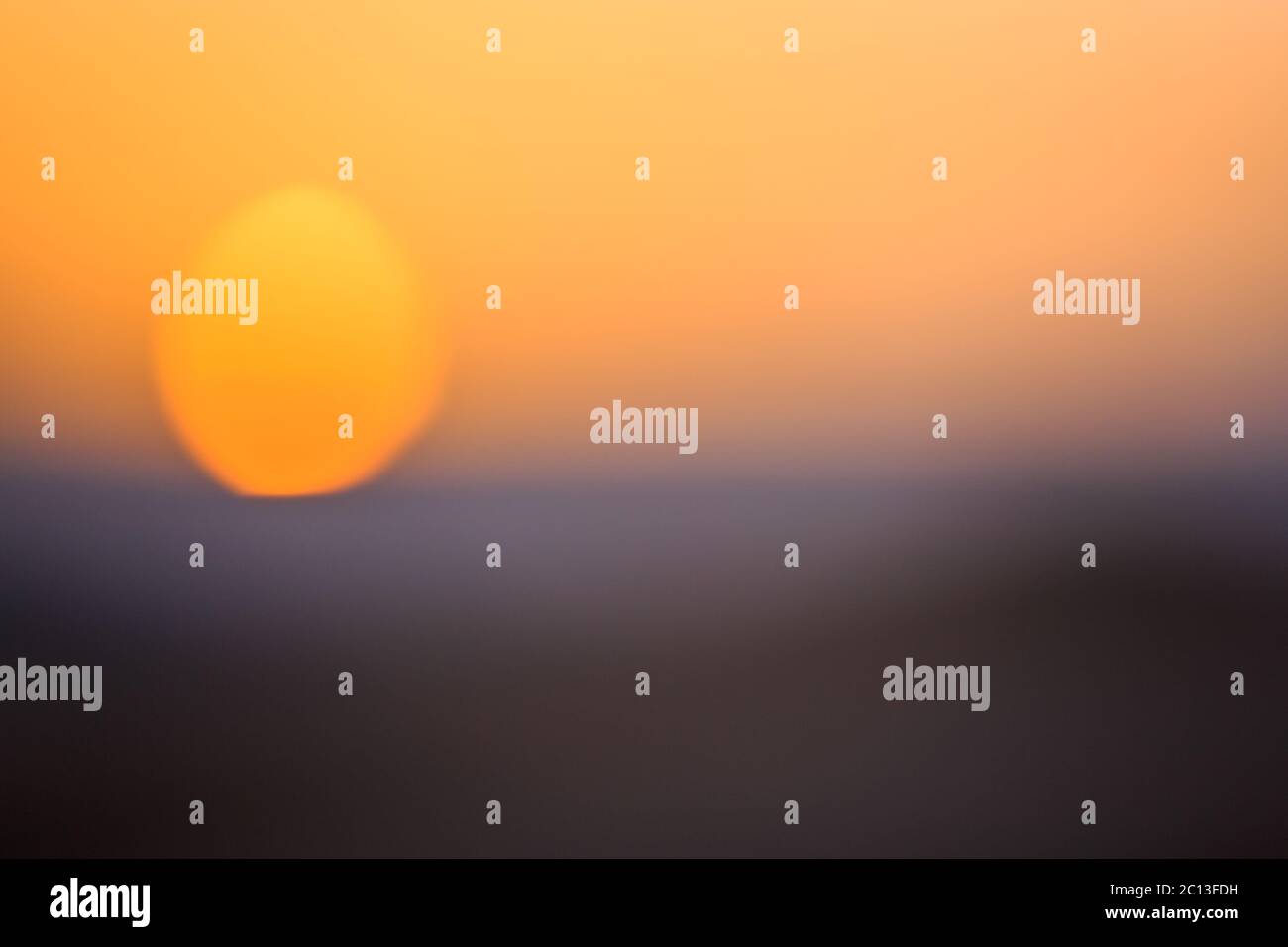 Beautiful blurry sunset over the sand dunes in the Sahara desert ...