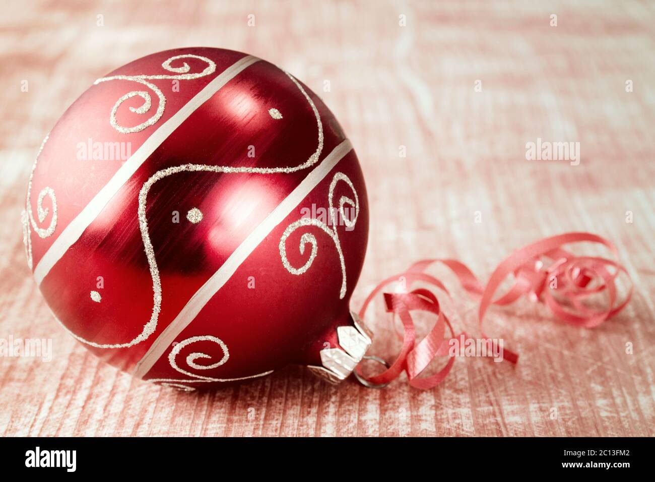 Christmas bauble with ribbon Stock Photo - Alamy