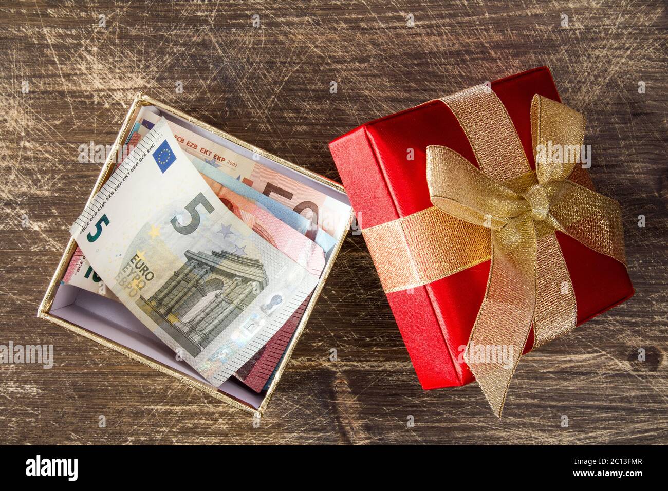 Gift box euro banknotes hi-res stock photography and images - Alamy