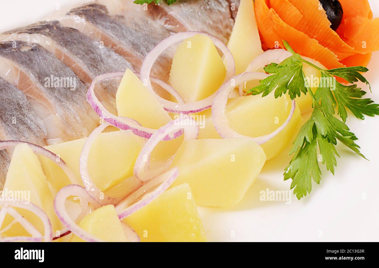 Salted herring with boiled potatoes Stock Photo - Alamy