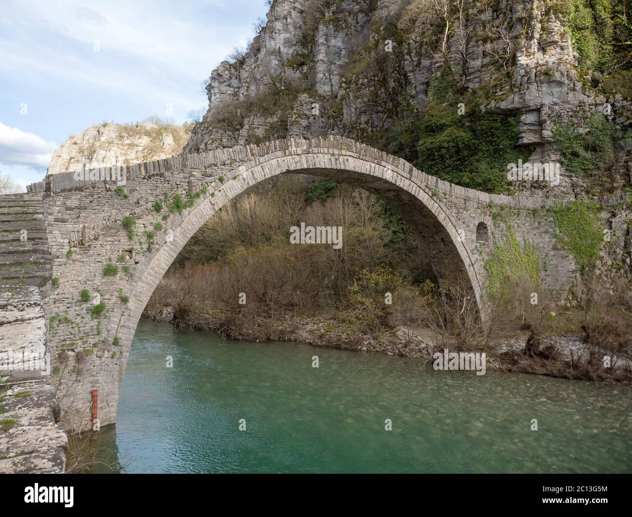 Old stone arched bridge named kokkori on Vikos canyon, Zagorochoria ...