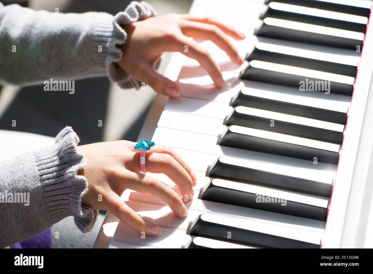 Hand Touch Piano Keys Stock Photo Alamy
