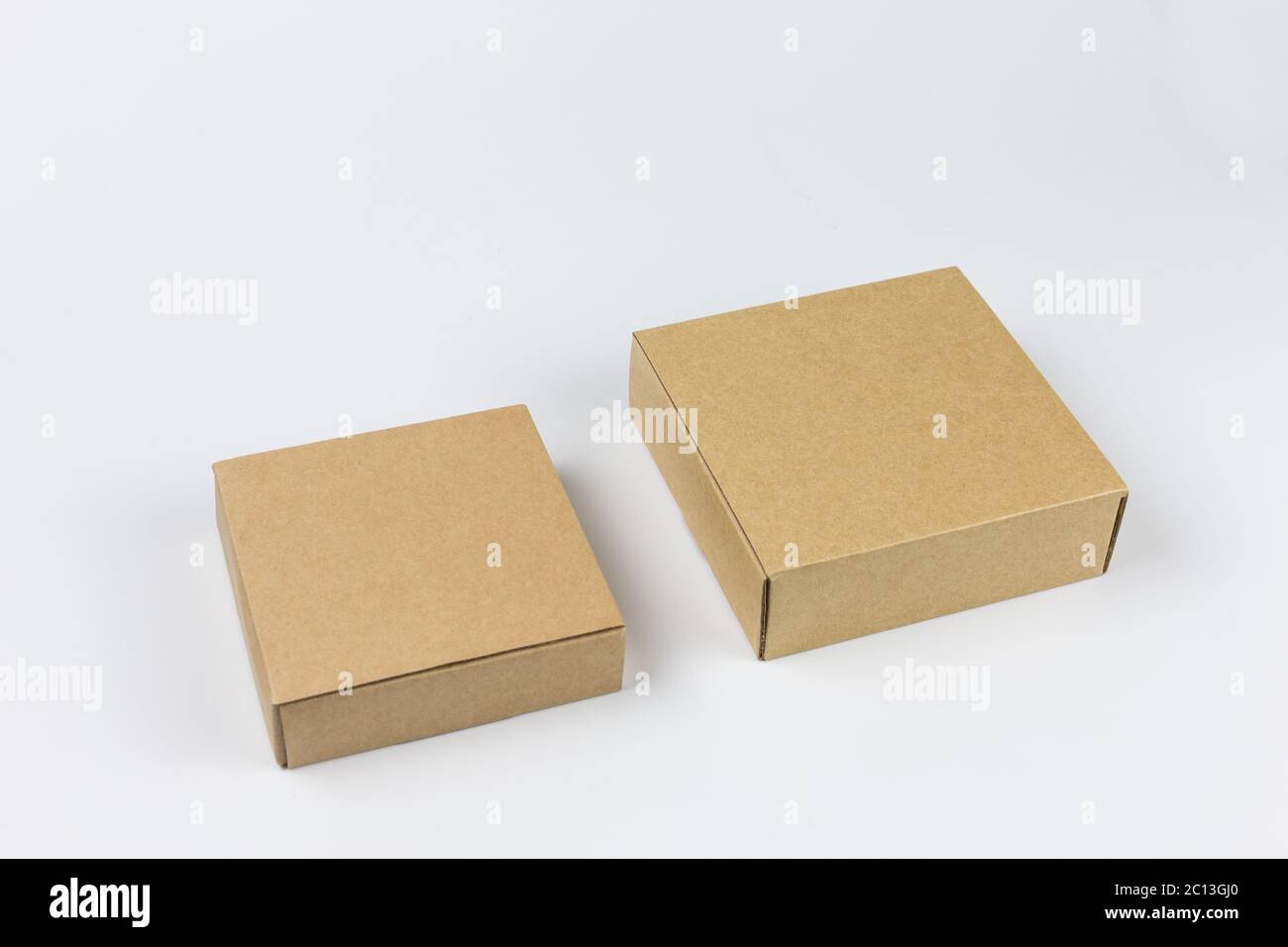 isolated yellow paper box on white background Stock Photo - Alamy