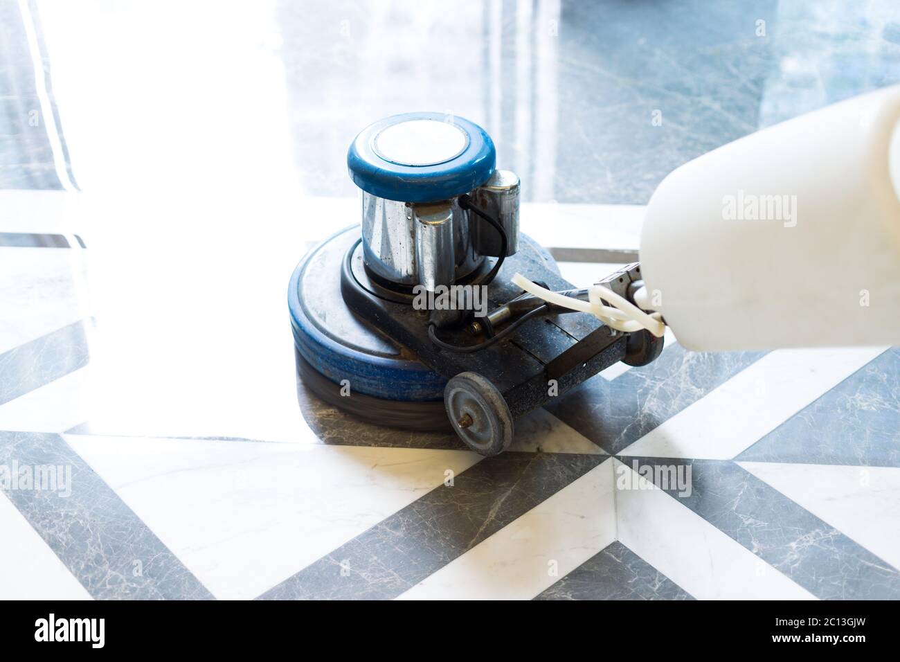 working polisher on marble floor Stock Photo - Alamy
