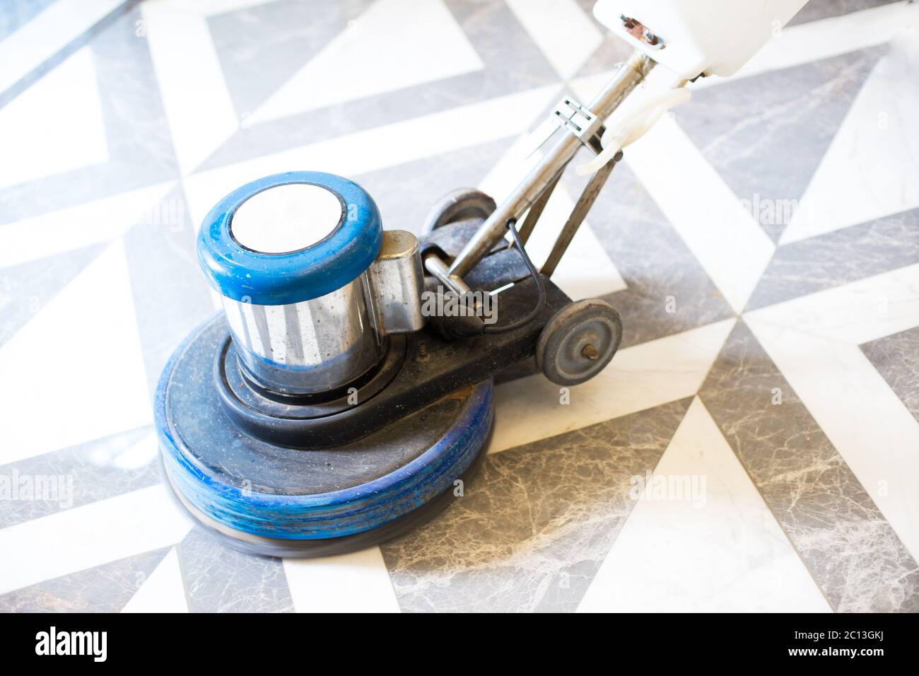 working polisher on marble floor Stock Photo - Alamy