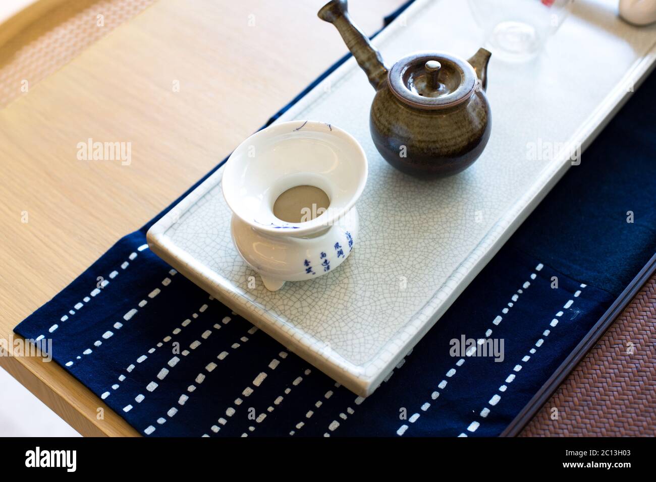 elegant ceramic tea sets on table in modern living room Stock Photo - Alamy