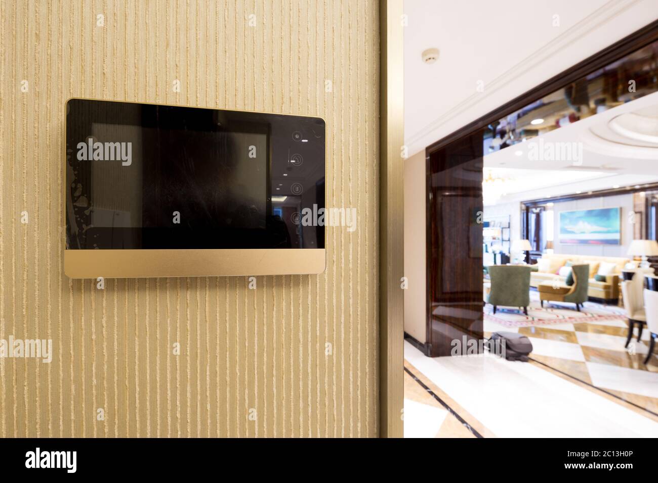 intercom video door bell on wall outside modern living room Stock Photo ...