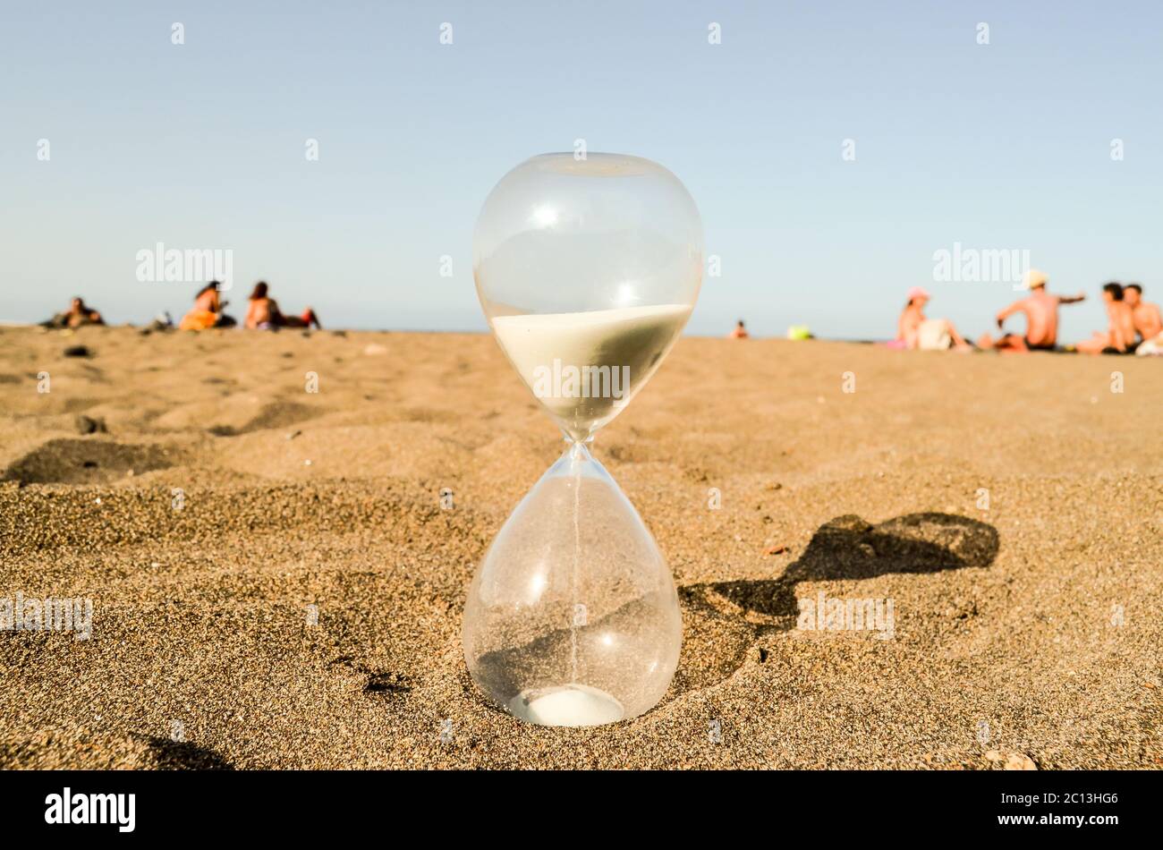 Hourglass Clock on the Sand Beach Stock Photo - Alamy