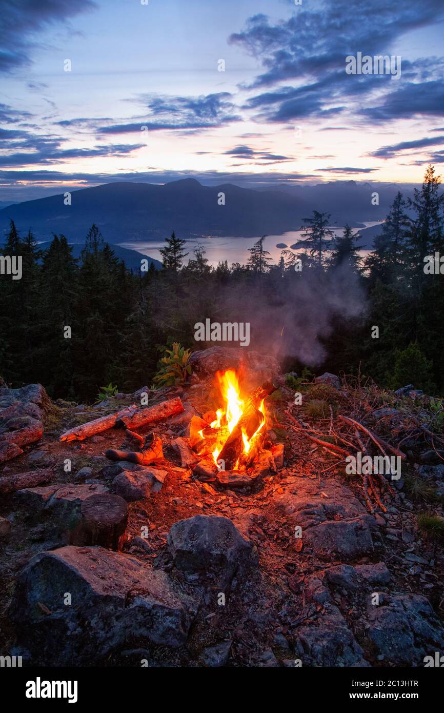Warm Camp Fire on top of a mountain with Beautiful Canadian Nature ...