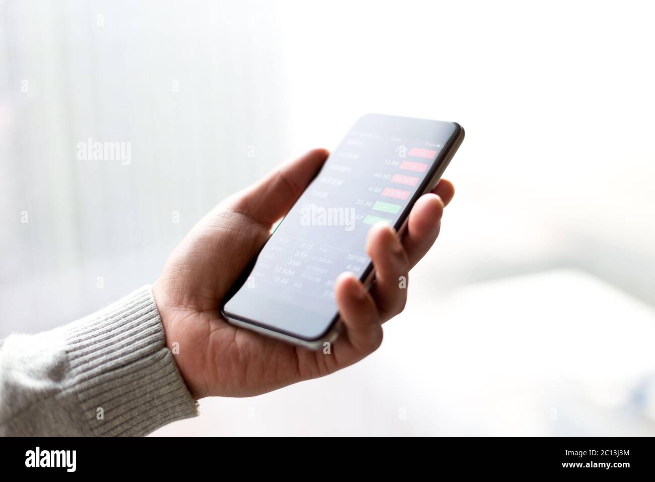 mobile phone in man's hand Stock Photo - Alamy