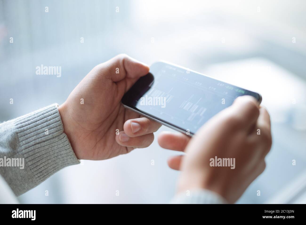 mobile phone in man's hand Stock Photo - Alamy