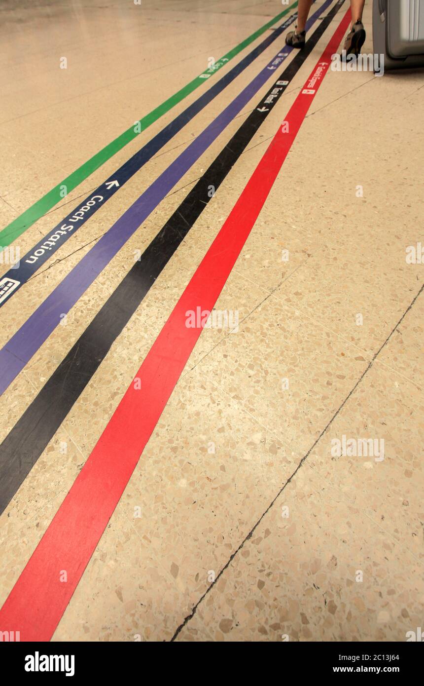 Direction lines on train station Stock Photo - Alamy