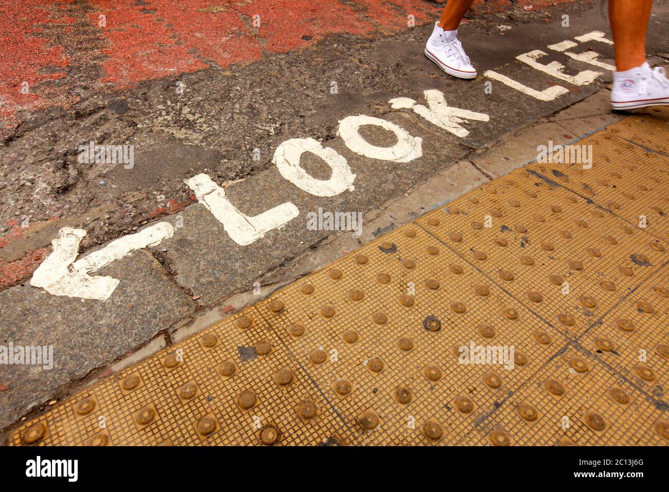 Look left warning pedestrian zebra hi-res stock photography and images ...