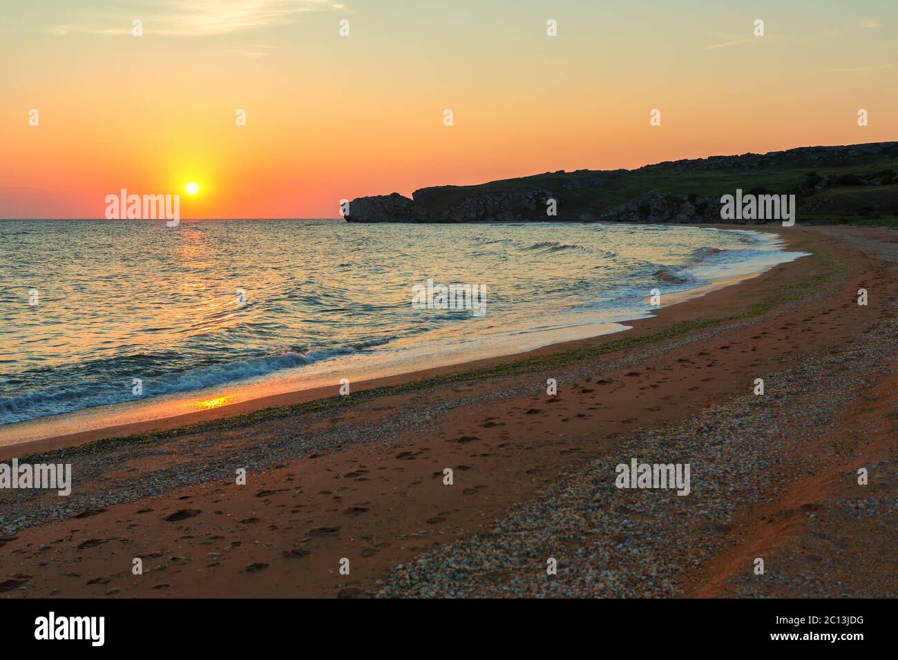 Sun rises over the Sea of Azov on Generals beach. Karalar regional ...