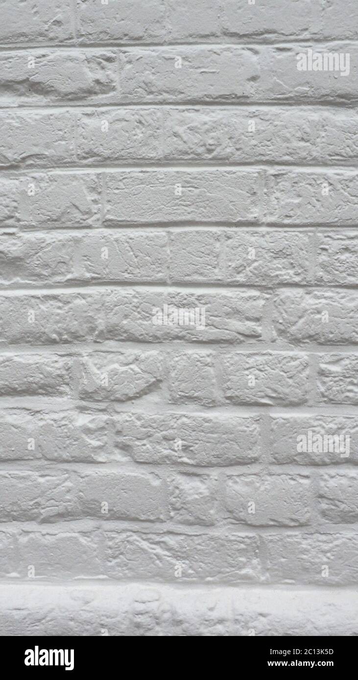 White brick wall background - vertical Stock Photo - Alamy