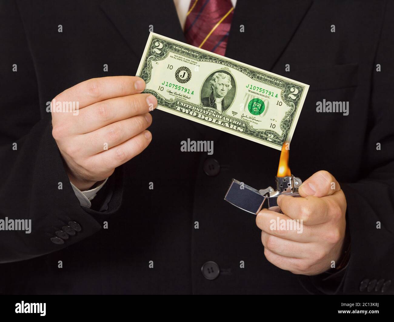 Burn money with lighter hi-res stock photography and images - Alamy