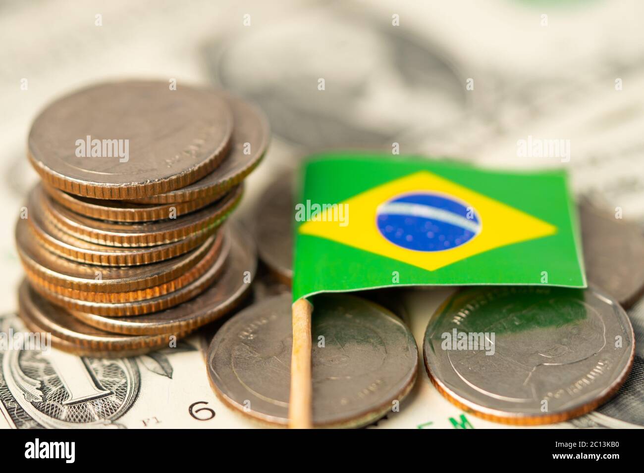 Stack of coins with Brazil flag on white background Stock Photo - Alamy