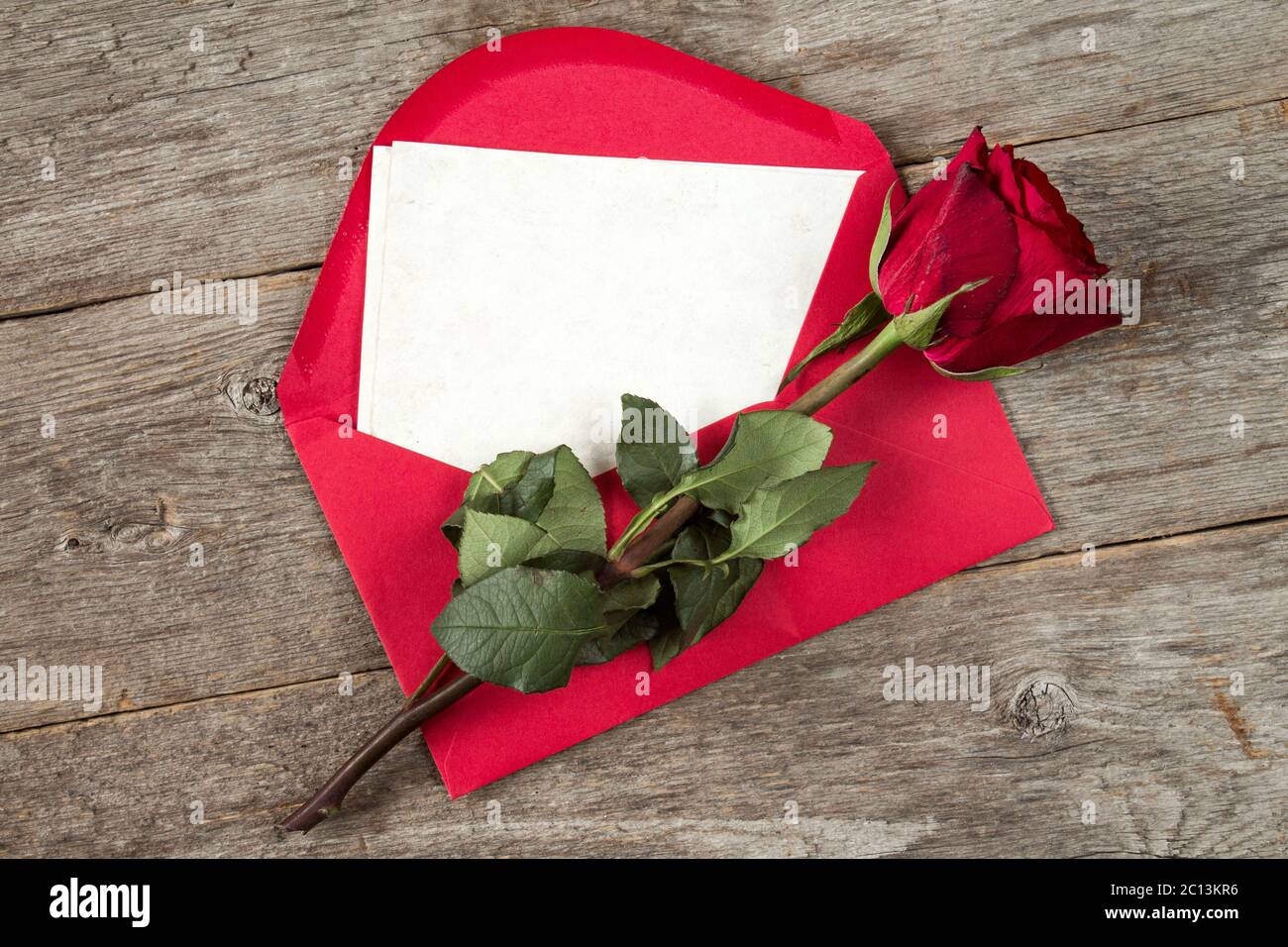 Red rose flower envelope hi-res stock photography and images - Alamy