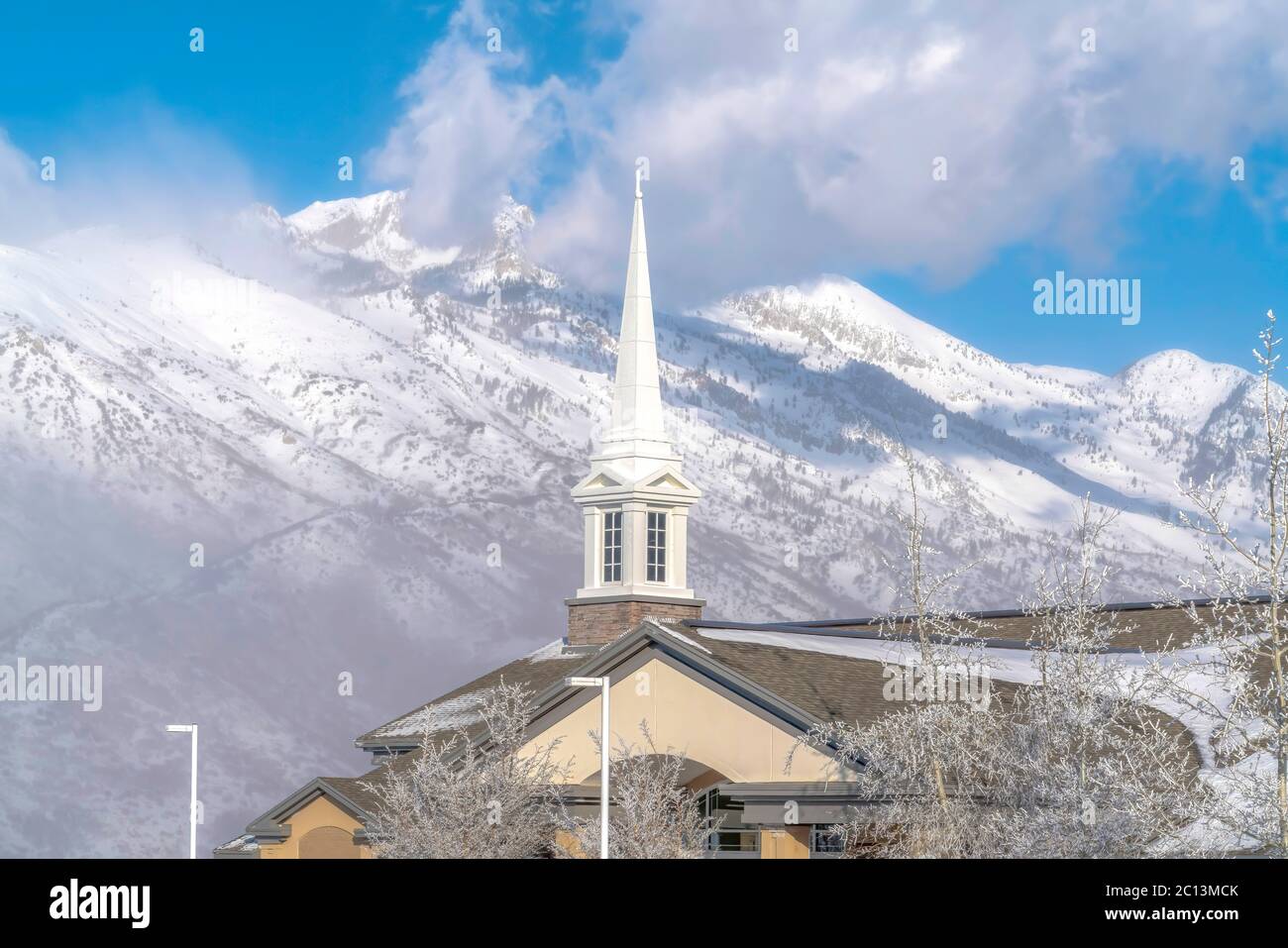 Magnificent view of snow covered Wasatch Mountain with church in the ...