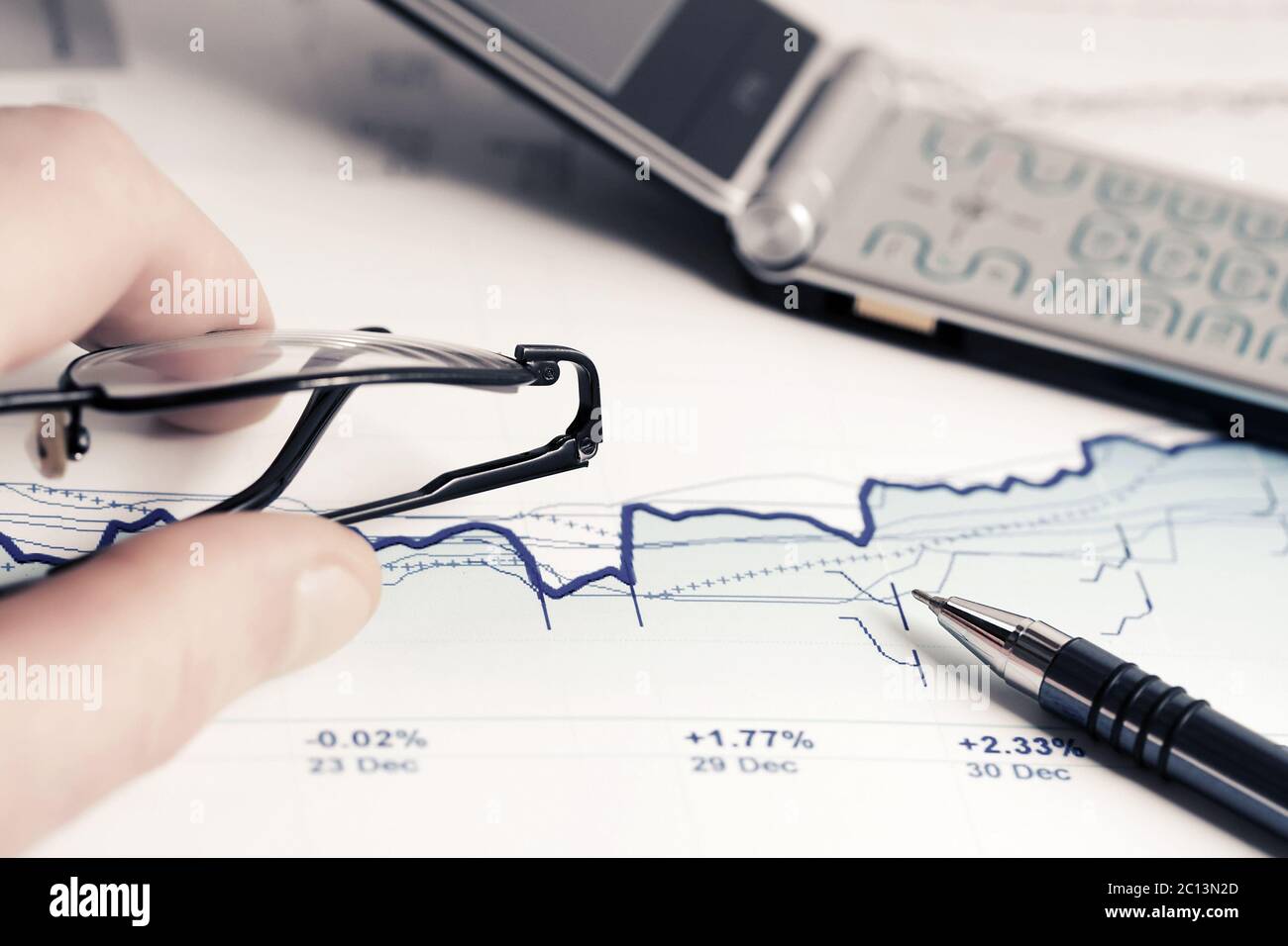 Financial graphs analysis Stock Photo - Alamy