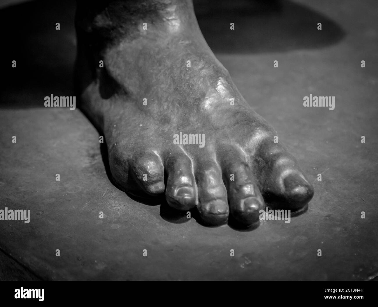 Stone foot of ancient Roman statue Stock Photo - Alamy