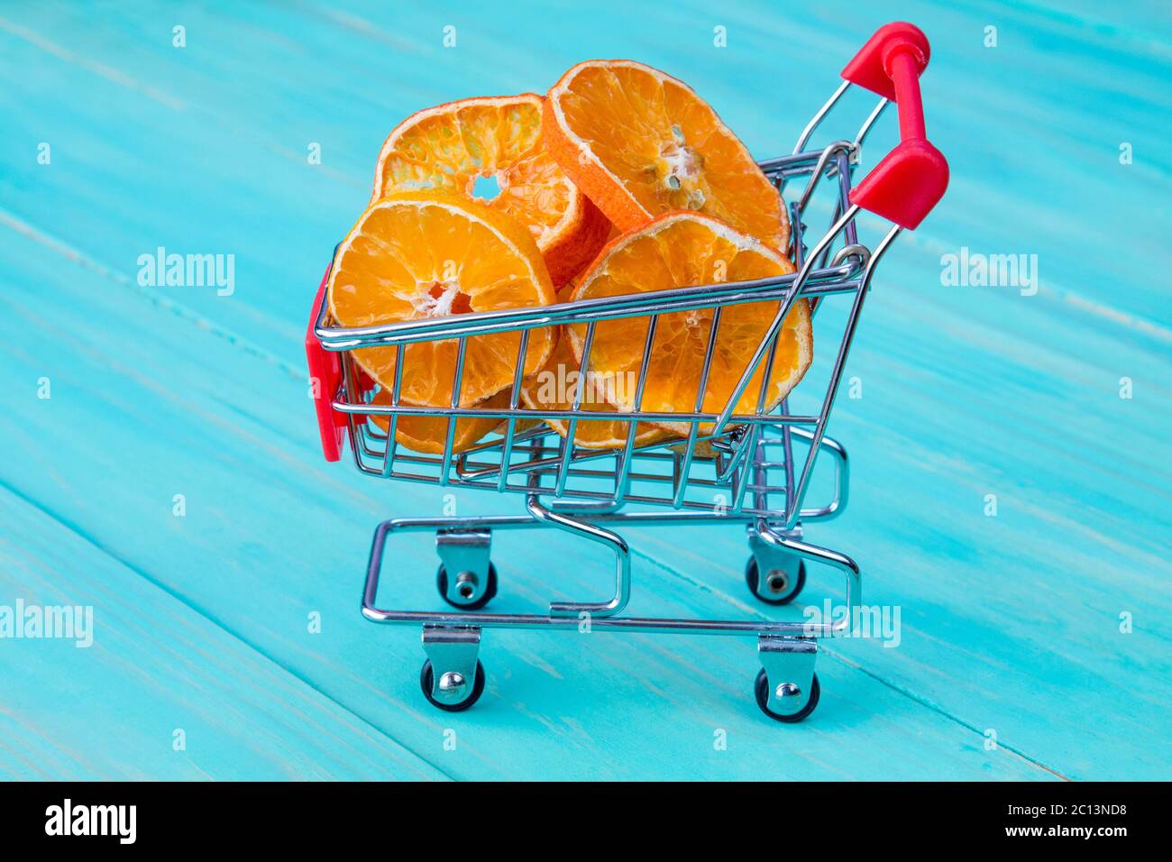 Shopping cart full of orange slices Stock Photo - Alamy