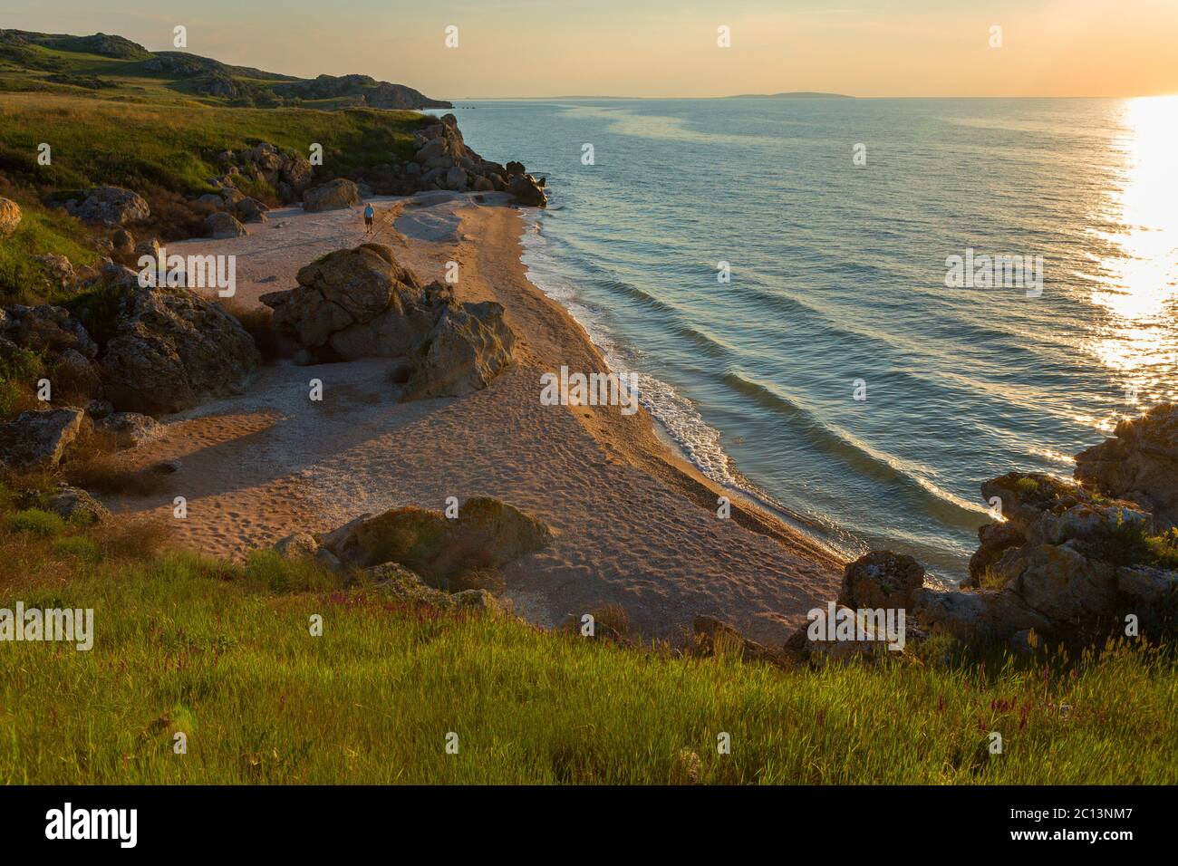 Sunset over the Sea of Azov on Generals beach. Karalar regional ...