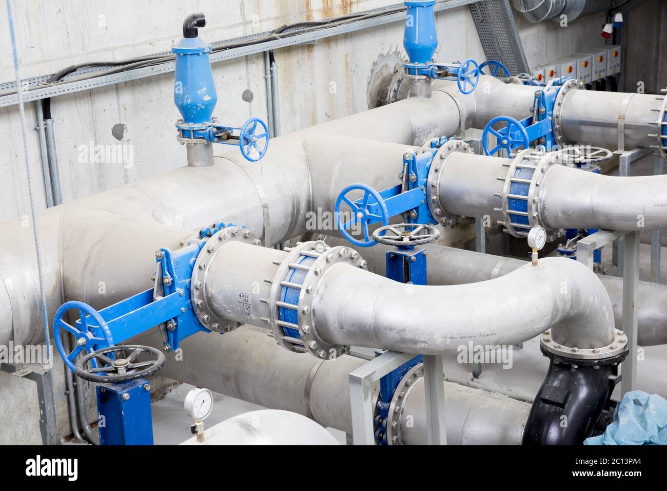 Wastewater treatment facility valves pipes Stock Photo - Alamy